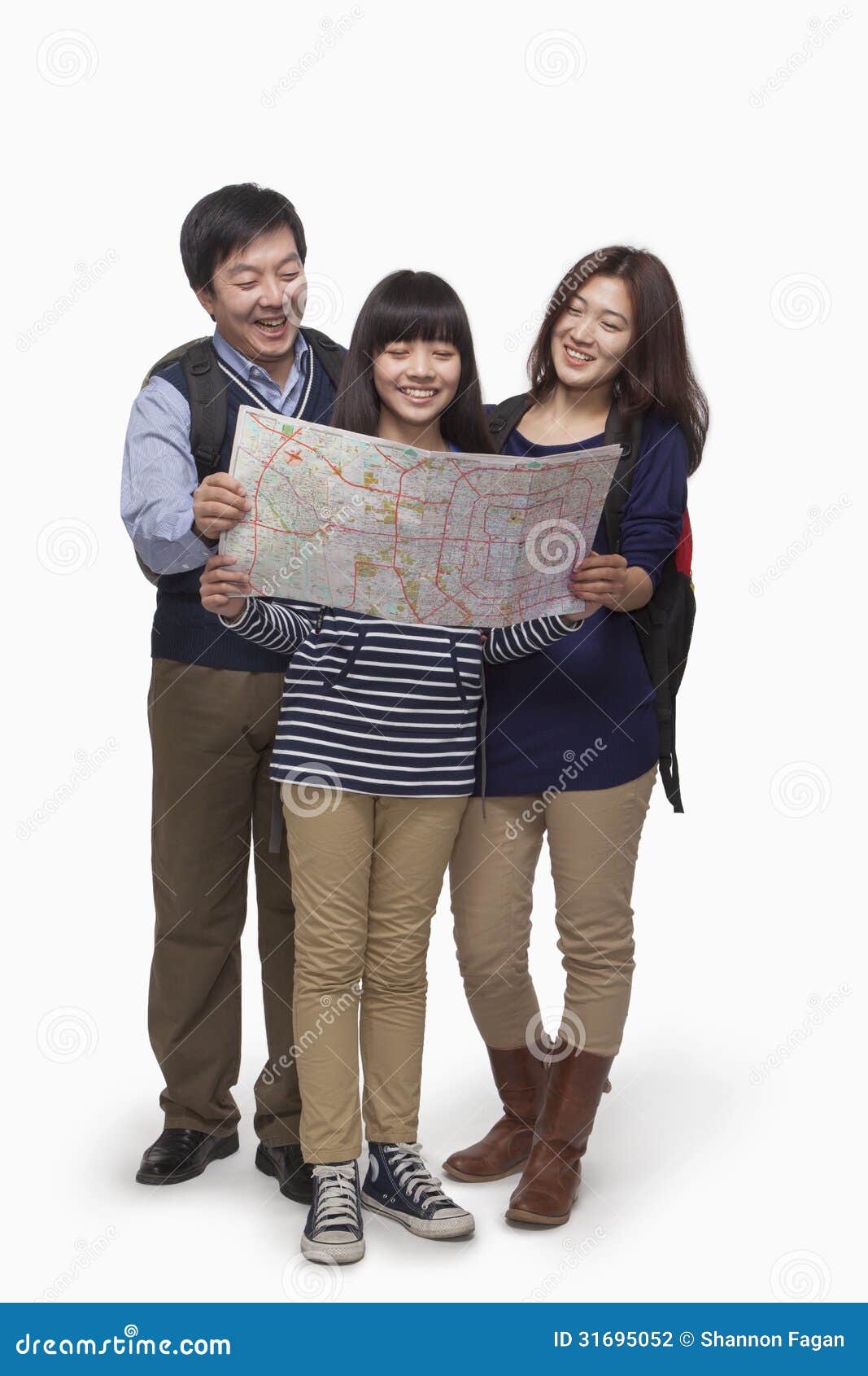 Girl with Parents Checking Map Stock Photo - Image of enjoyment ...