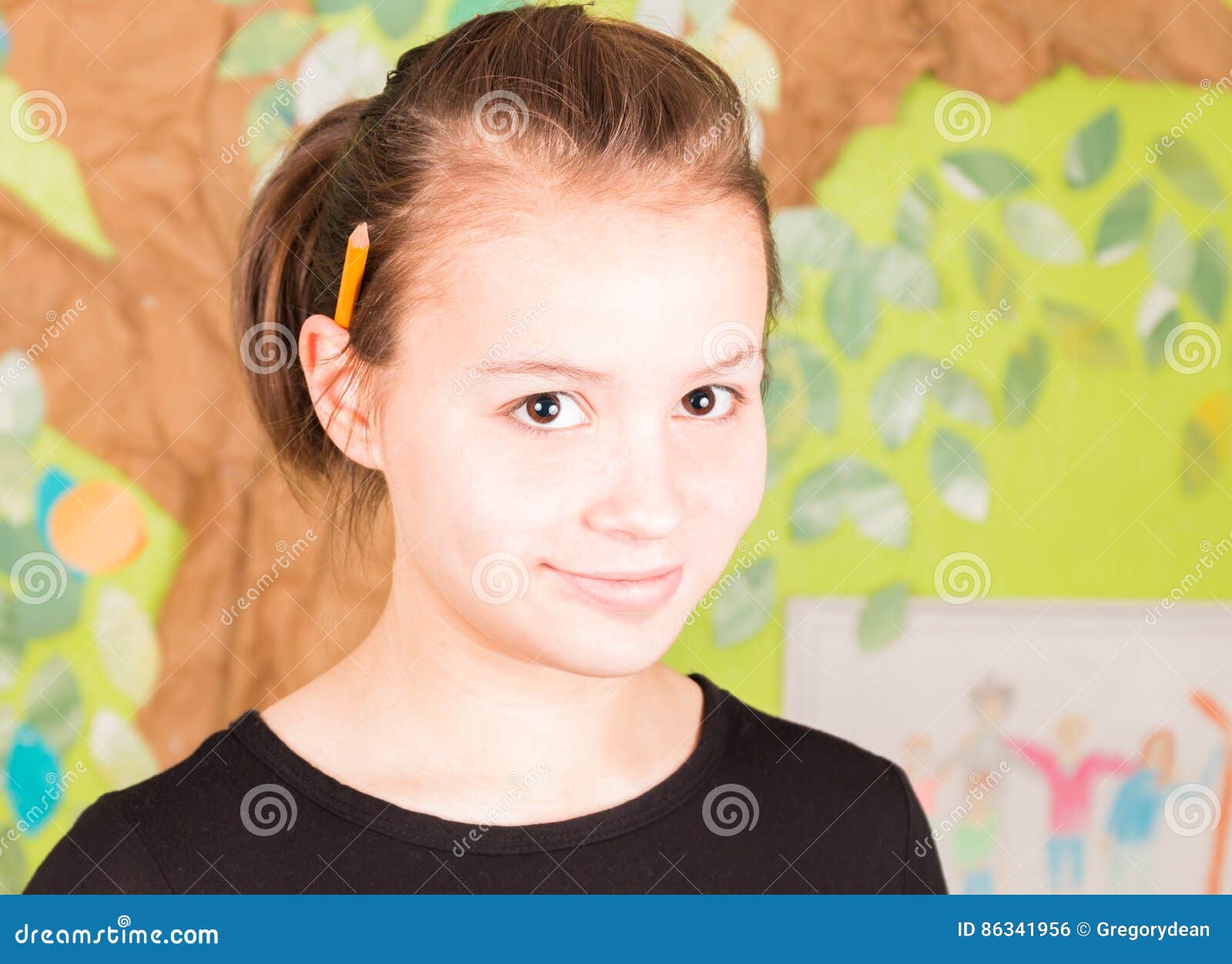 Girl with Pencil on Ear stock photo. Image of school - 86341956