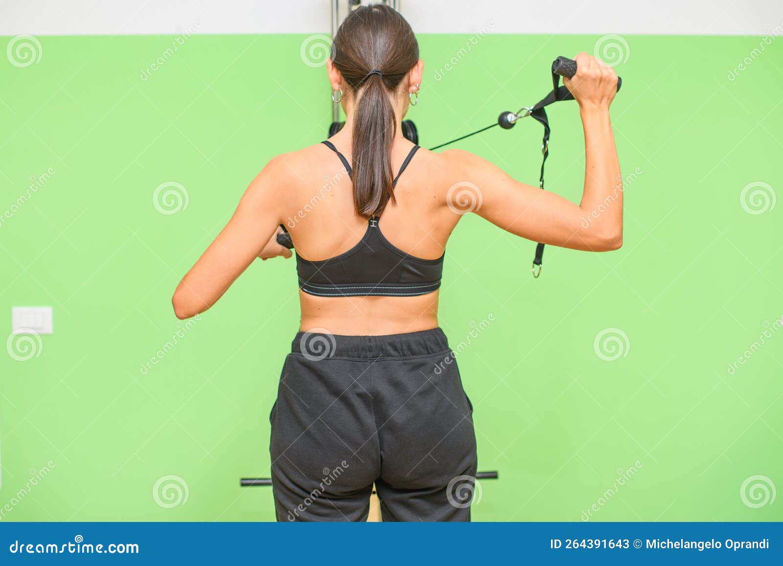A Girl Performs Shoulder and Back Exercise Stock Image - Image of back ...