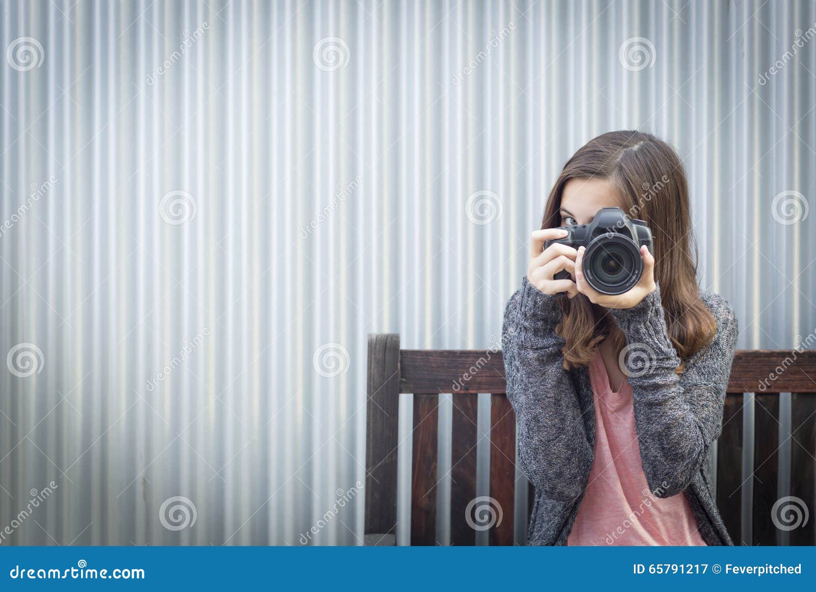 Girl Photographer Sitting and Pointing Camera Stock Image - Image of ...