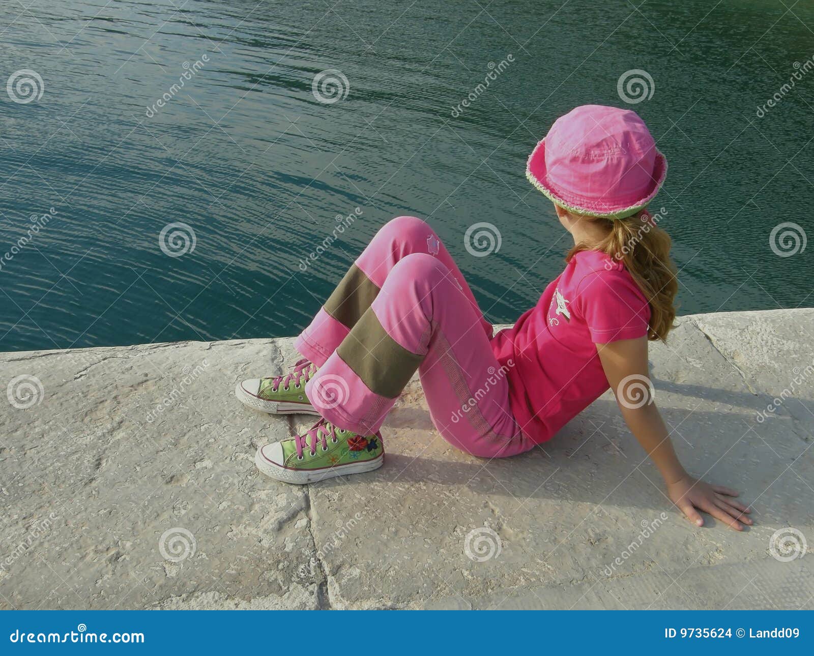 Girl in Pink Cap and Blue Sea Stock Photo - Image of alone, adolescence ...
