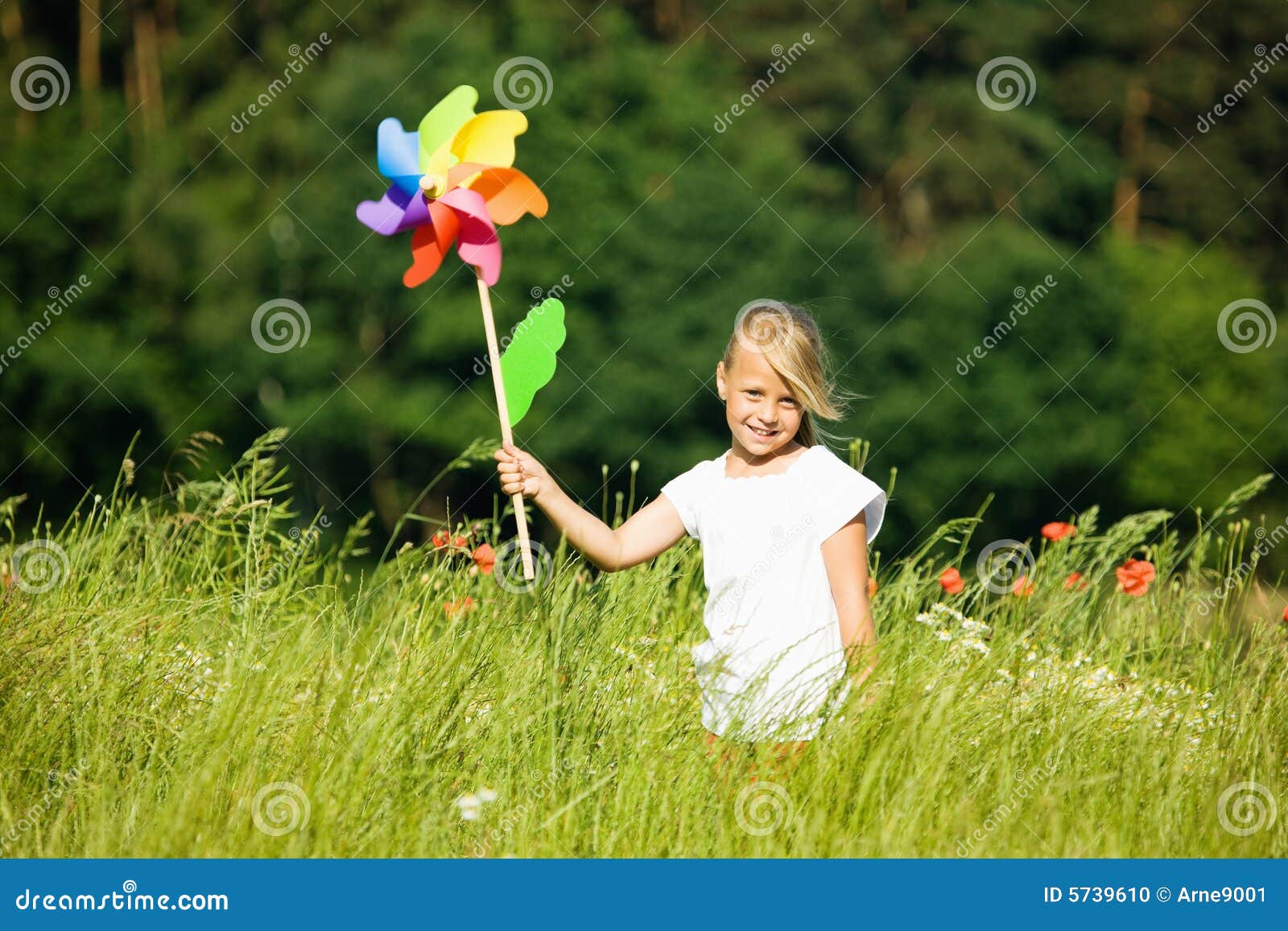 Girl with pinwheel stock photo. Image of daughter, playful - 5739610
