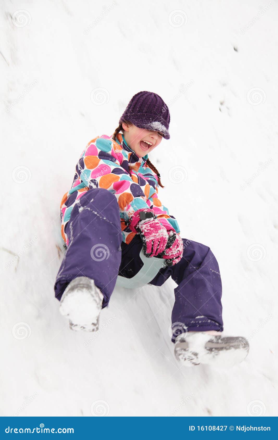 Girl on plastic sled stock image. Image of vertical, sled - 16108427