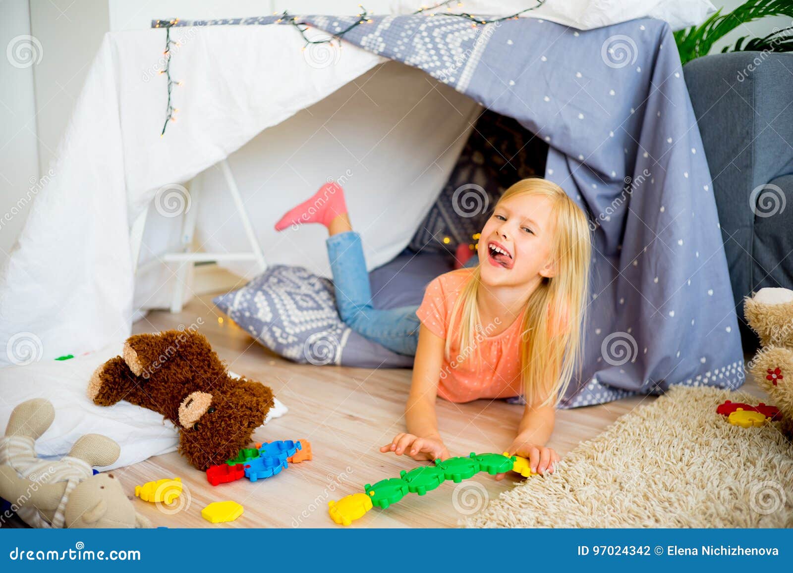 Girl in a play tent stock photo. Image of pillow, child - 97024342