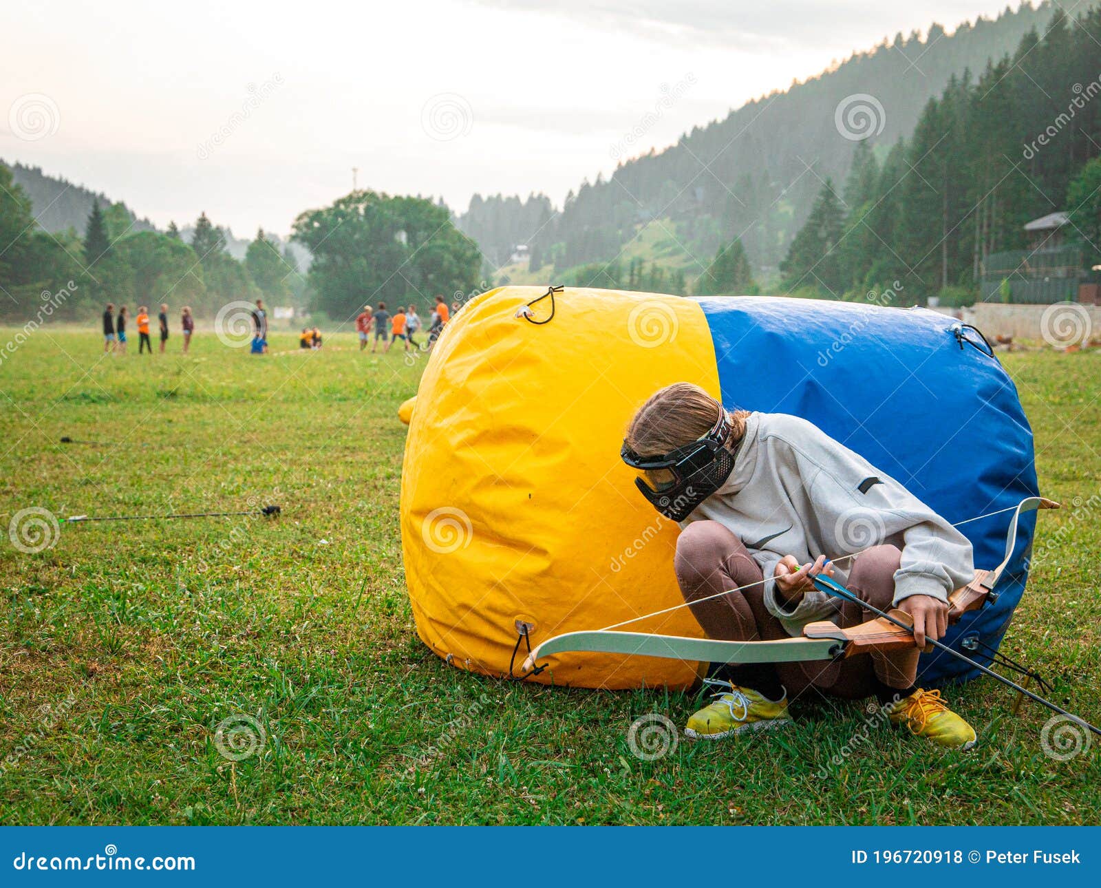 Girl Playing Archery Tag on a Field Editorial Stock Photo - Image of ...