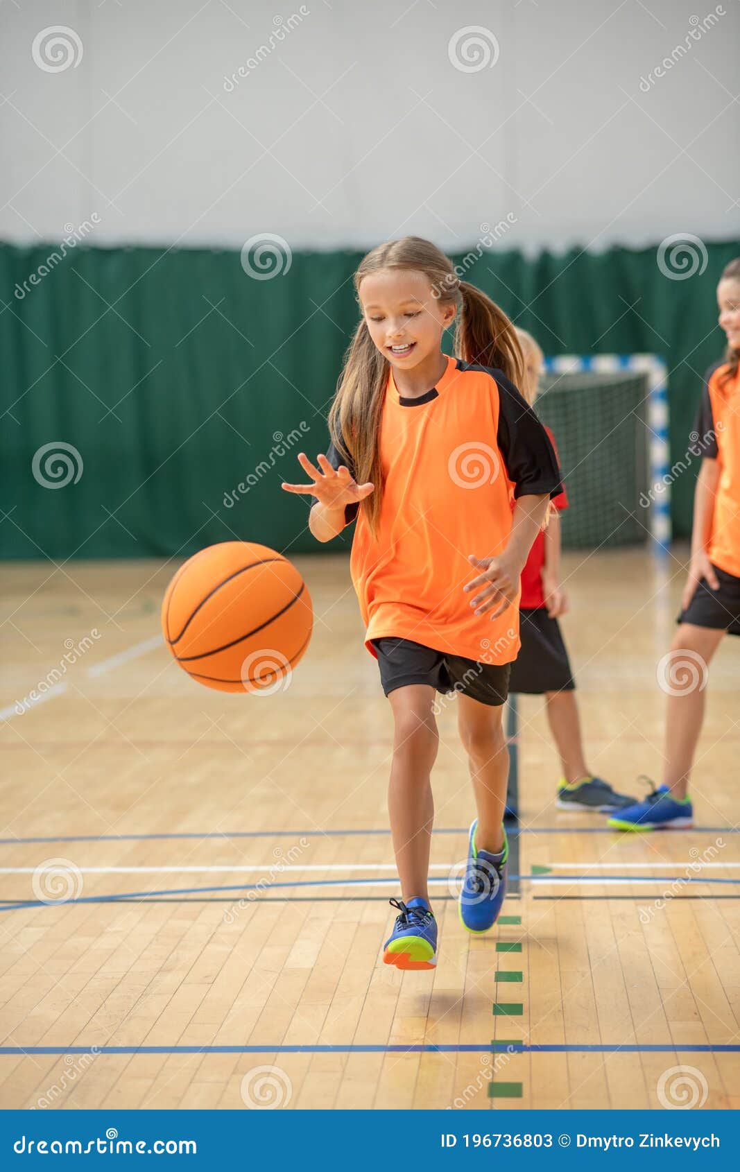 A Girl Playing with a Ball and Feeling Involved Stock Image - Image of ...