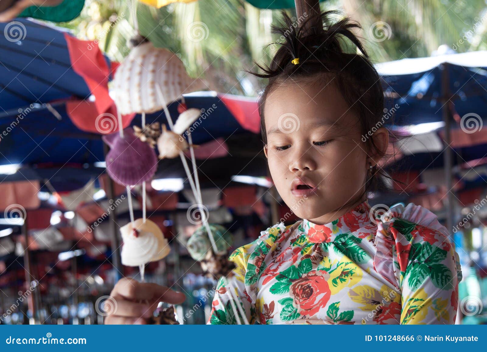 Girl Playing on the Beach with Shells Stock Photo - Image of swimsuit ...