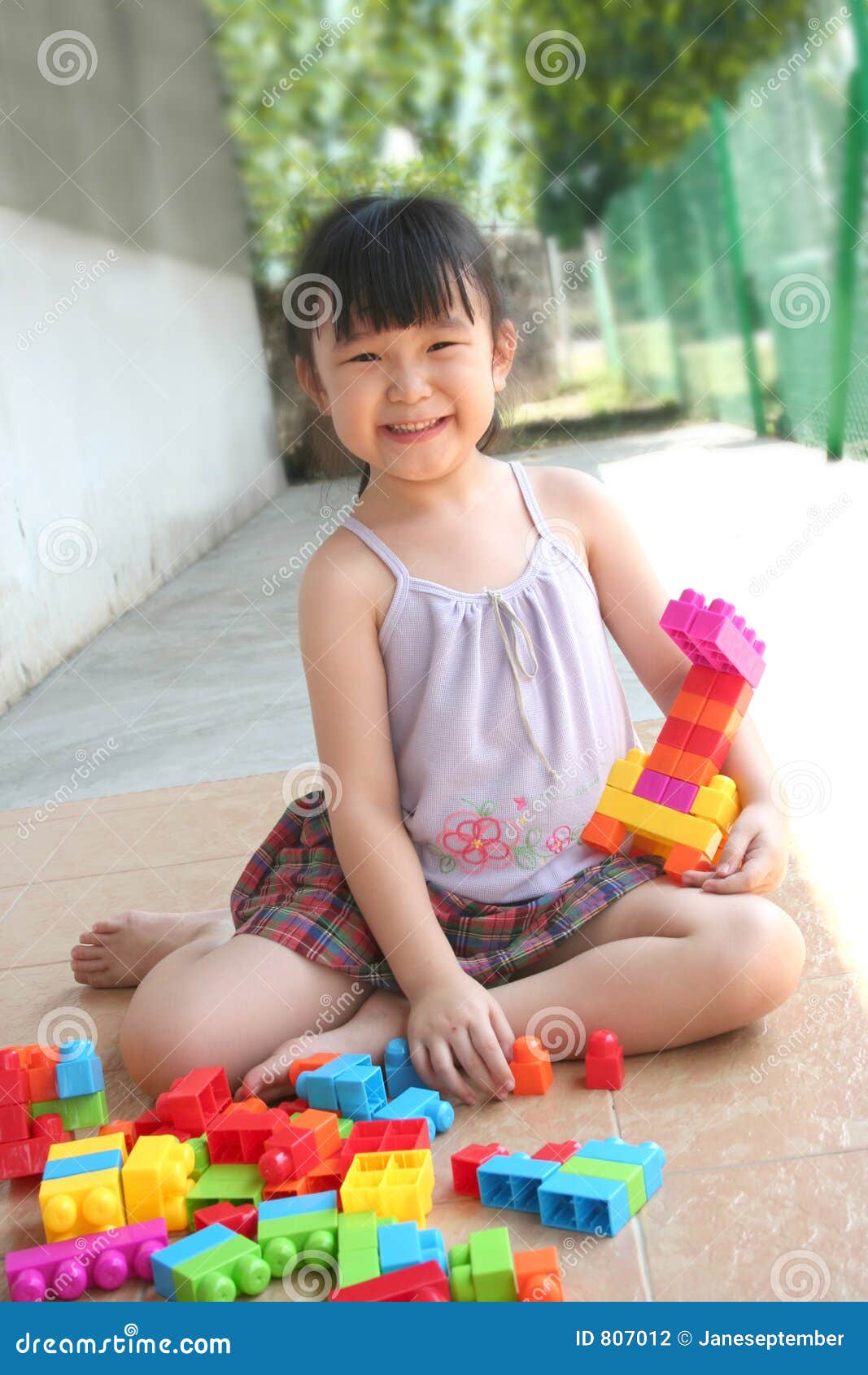 Girl playing blocks stock photo. Image of emotion, happy - 807012
