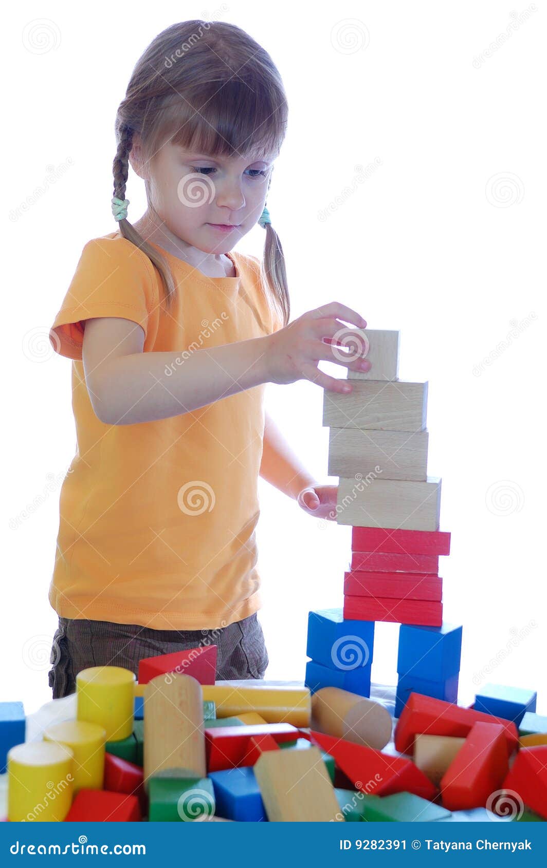 Girl playing with blocks stock image. Image of beautiful - 9282391
