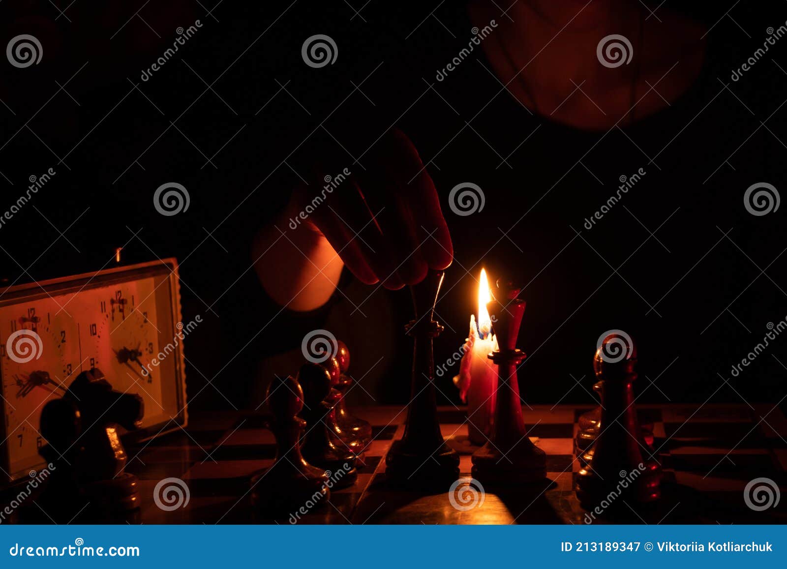 Girl Playing Chess in the Dark by Candlelight, Playing Stock Image ...