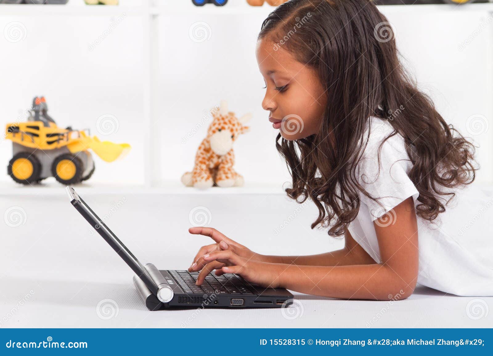 Girl playing computer stock image. Image of american - 15528315