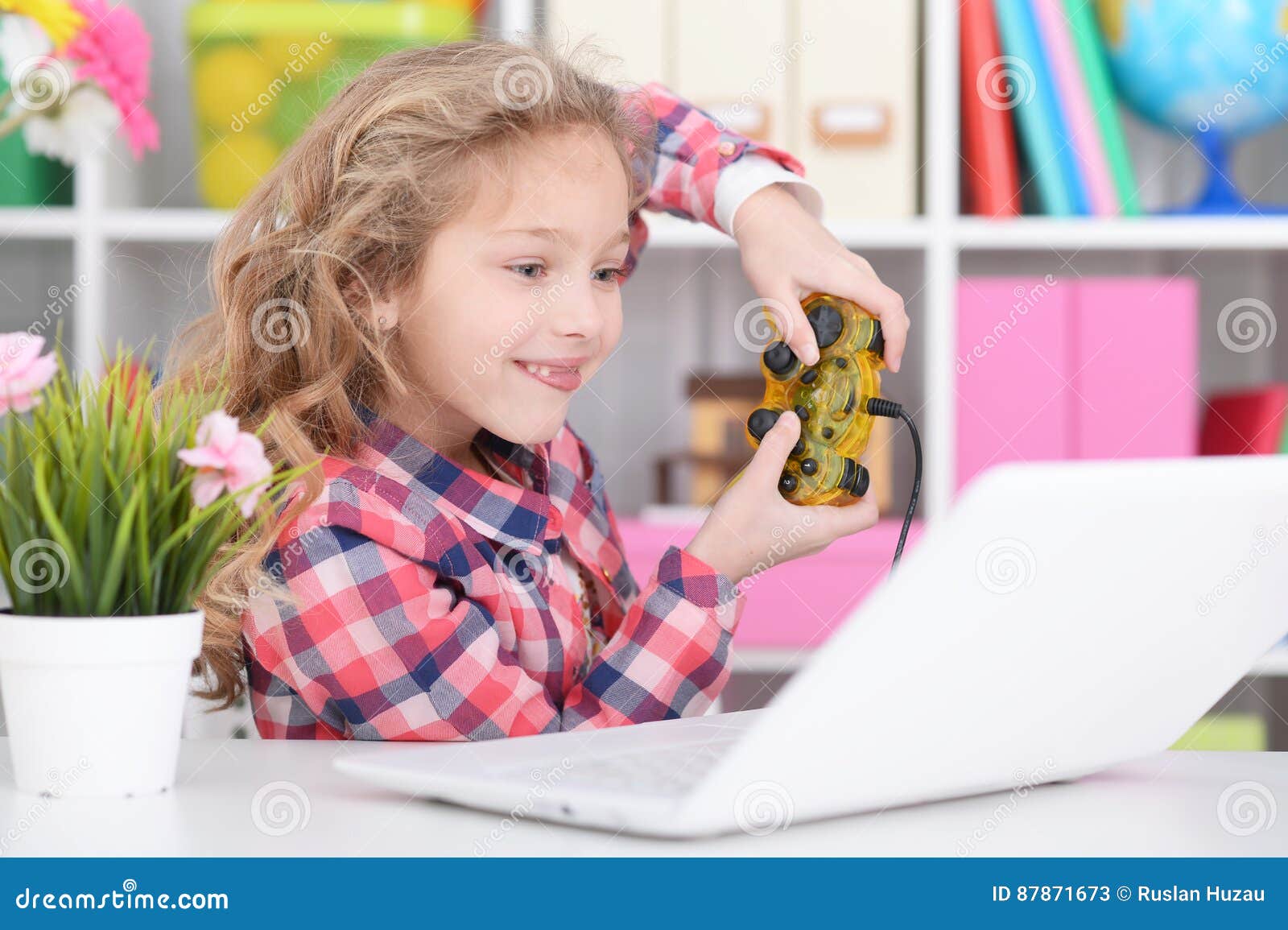 Girl is Playing a Computer Game Stock Image - Image of playing, laptop ...