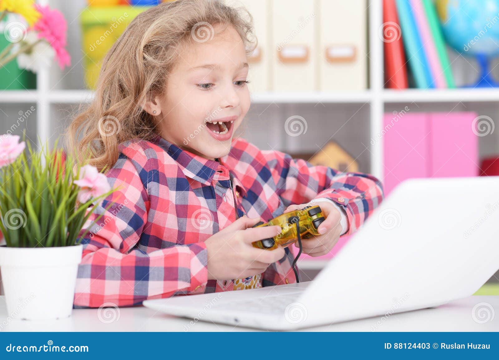 Girl is Playing a Computer Game Stock Image - Image of home, room: 88124403