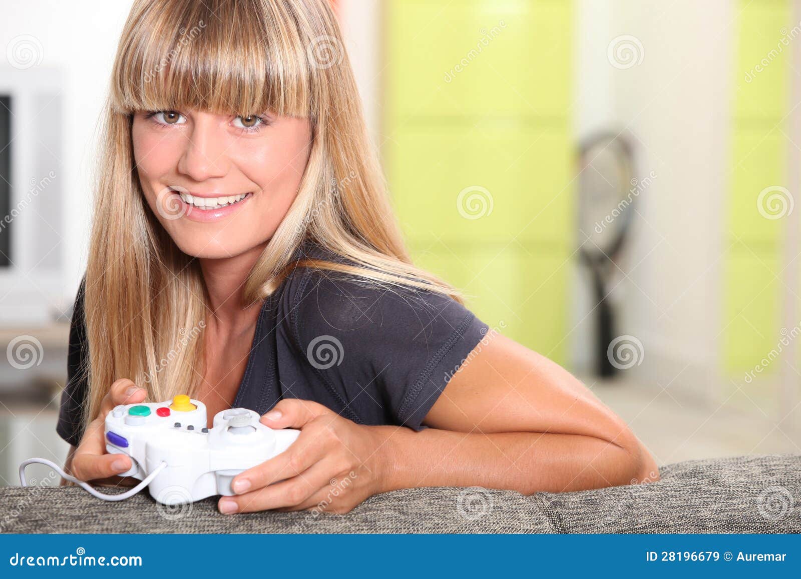 Girl playing with console stock image. Image of class - 28196679