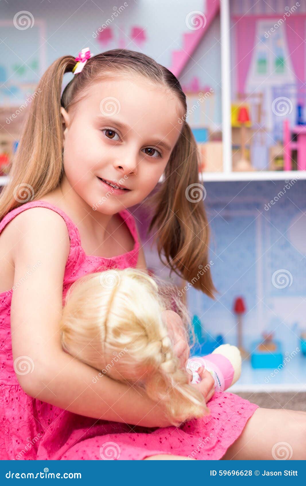 Girl Playing Dolls stock photo. Image of girl, toys, playing - 59696628