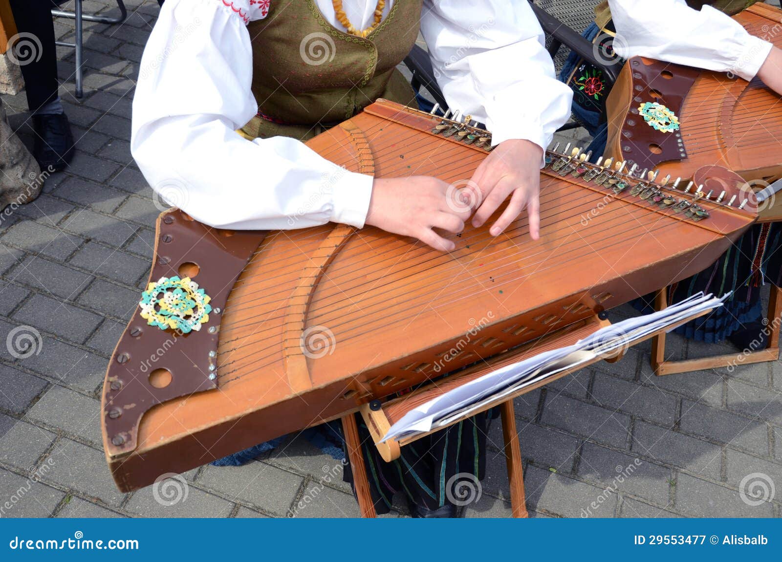 Girl Playing with Ethnographic String Musical Instrument Stock Image ...