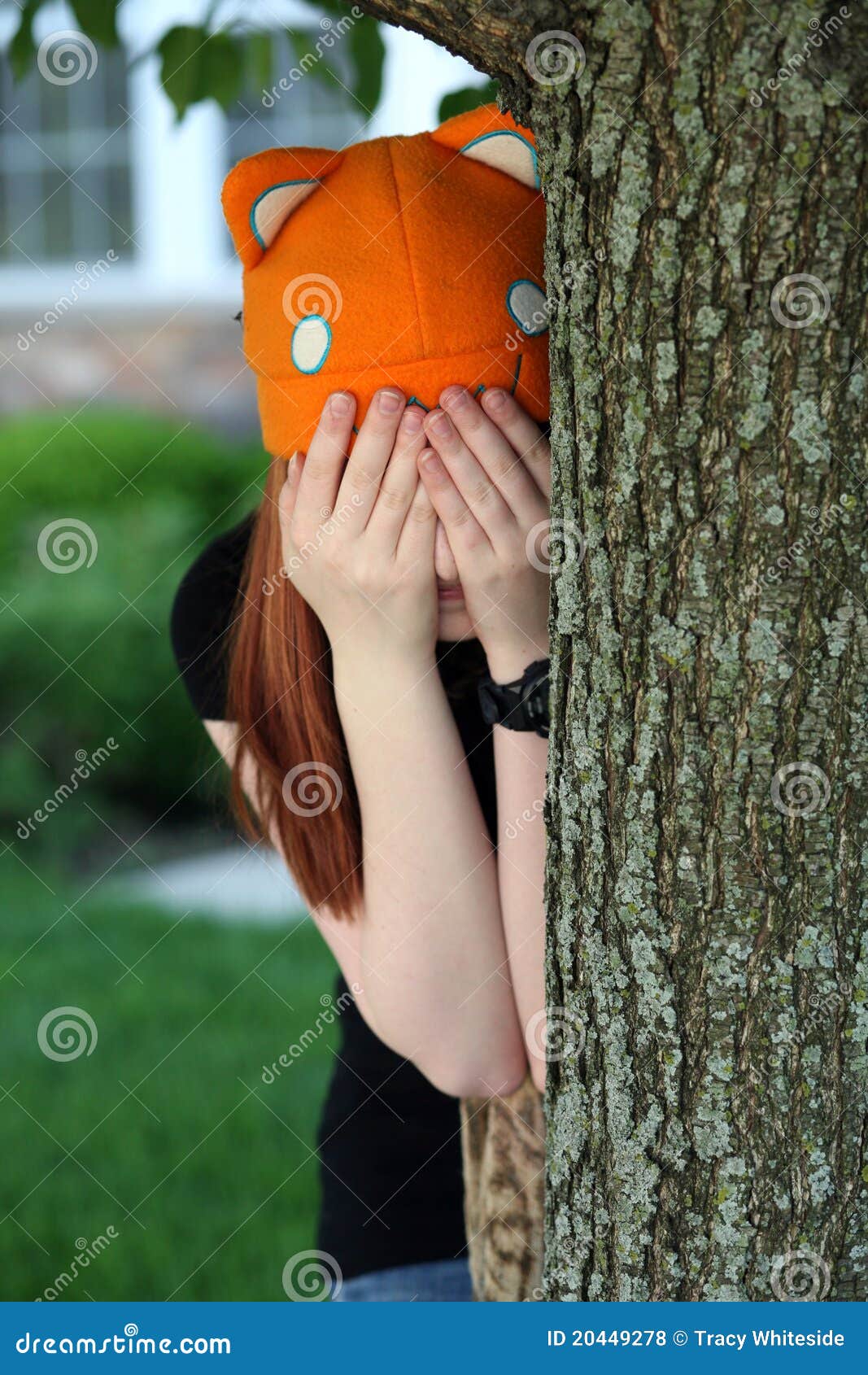 Girl Playing Hide and Go Seek Stock Photo - Image of smile, dressed ...
