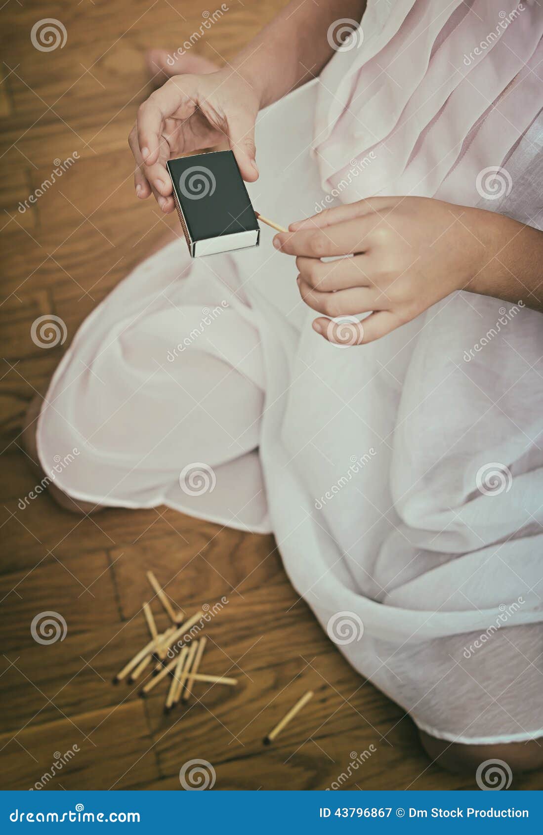 Girl playing with matches. stock image. Image of kindle - 43796867