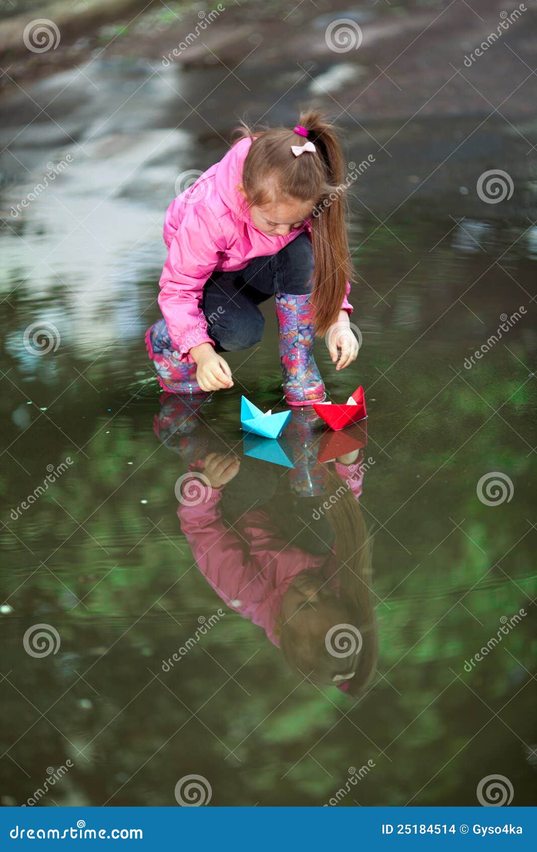 Girl playing in puddle stock photo. Image of beauty, legs - 25184514
