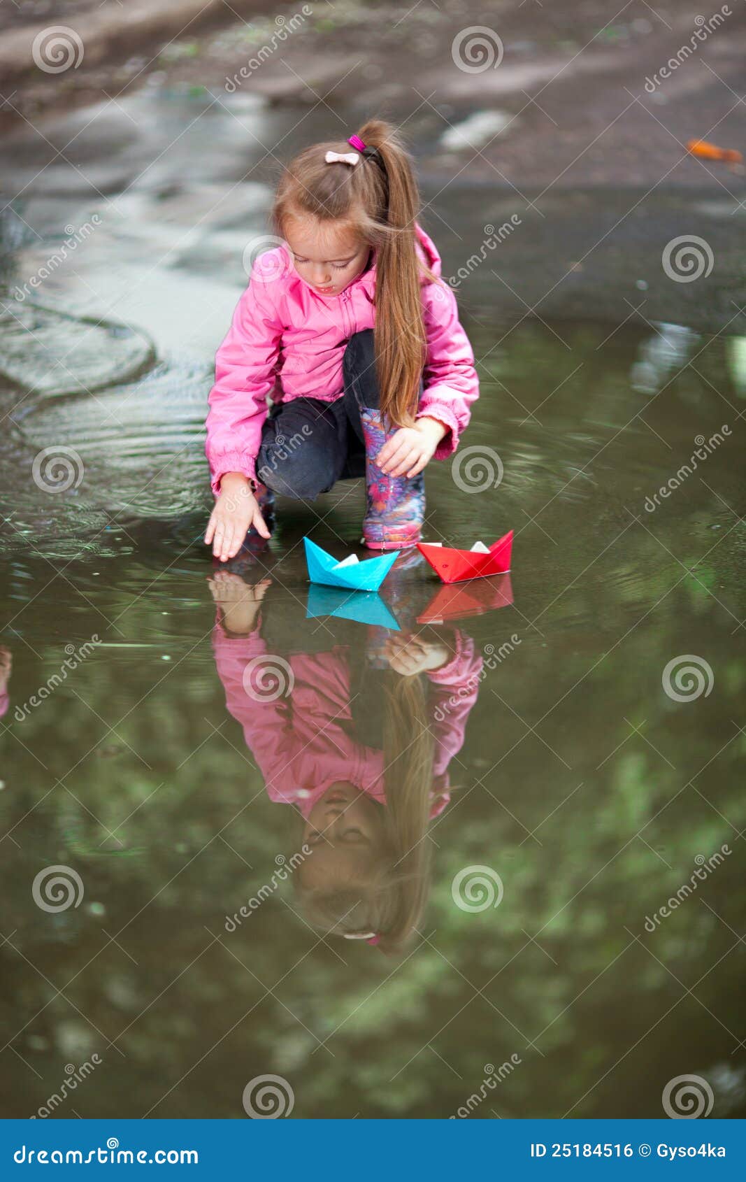 Girl playing in puddle stock photo. Image of girl, happiness - 25184516