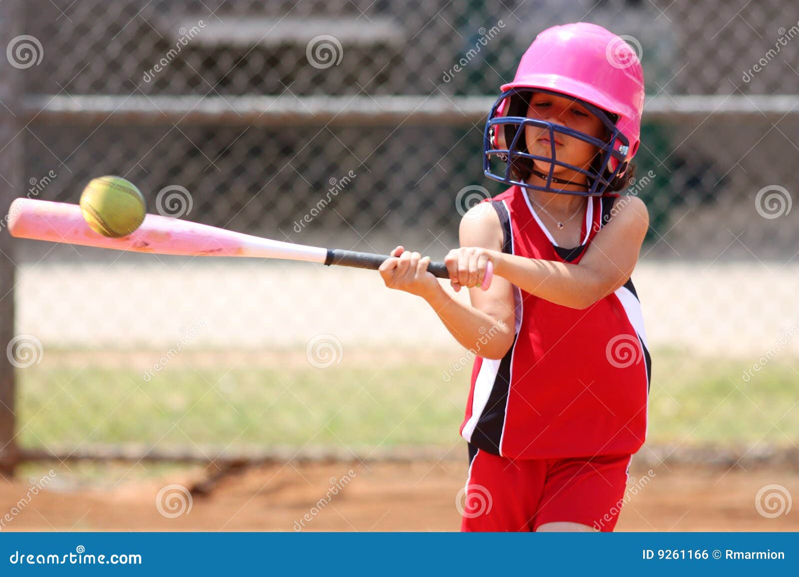 Girl Playing Baseball