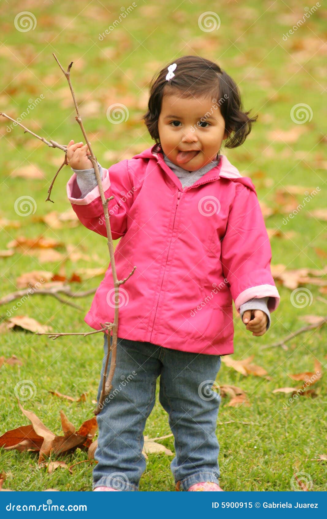 Girl playing with a stick. stock image. Image of fall - 5900915