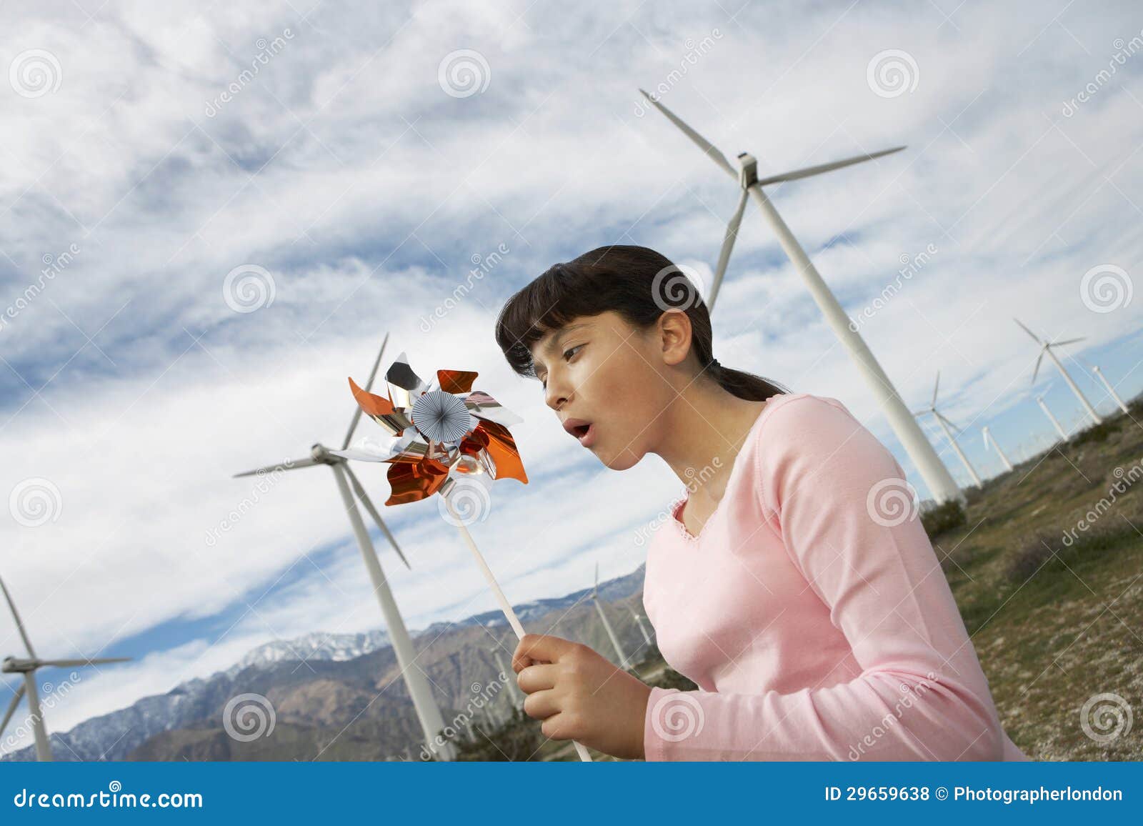 Girl Playing with Toy Windmill at Wind Farm Stock Photo - Image of ...
