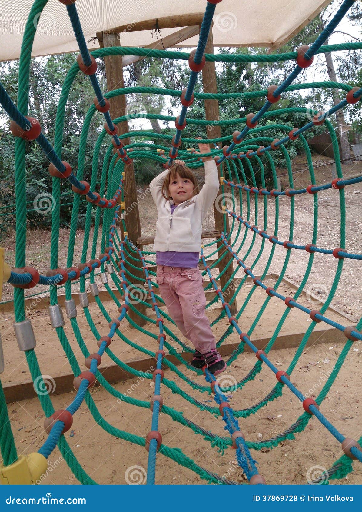 Girl Playing in Tunnel on Playground Stock Photo - Image of cute ...