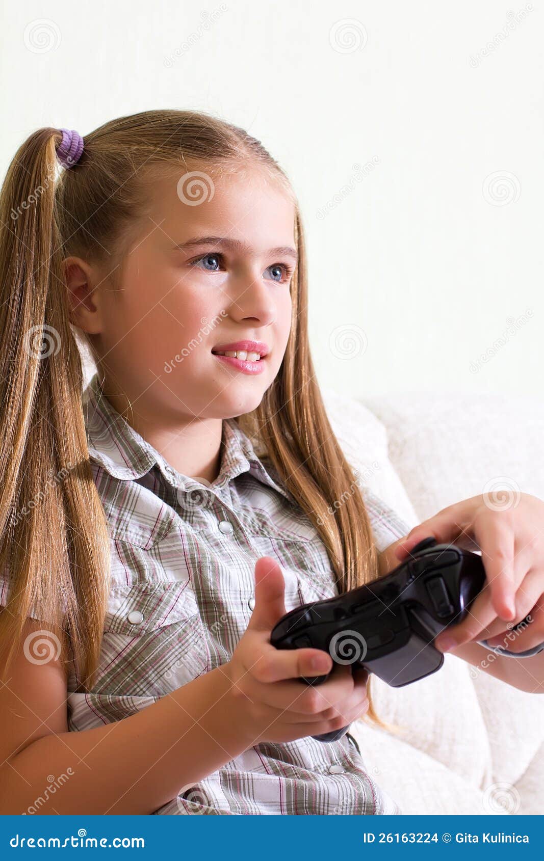 Girl playing video game. stock photo. Image of child - 26163224