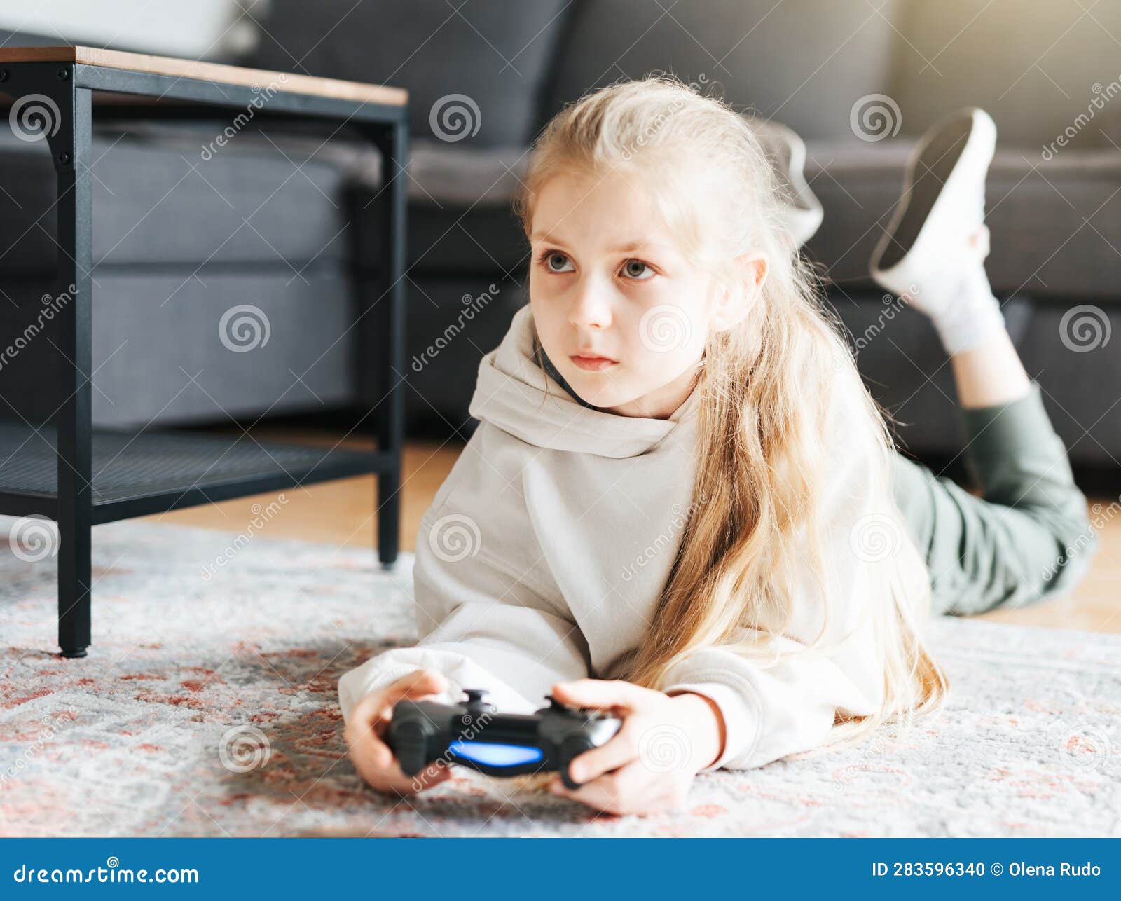 Girl Playing Video Game at Home Stock Photo - Image of joypad, console ...