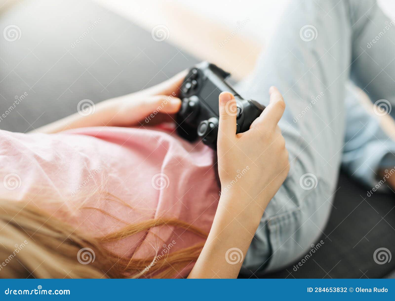 Girl Playing Video Game at Home Stock Photo - Image of device, gaming ...