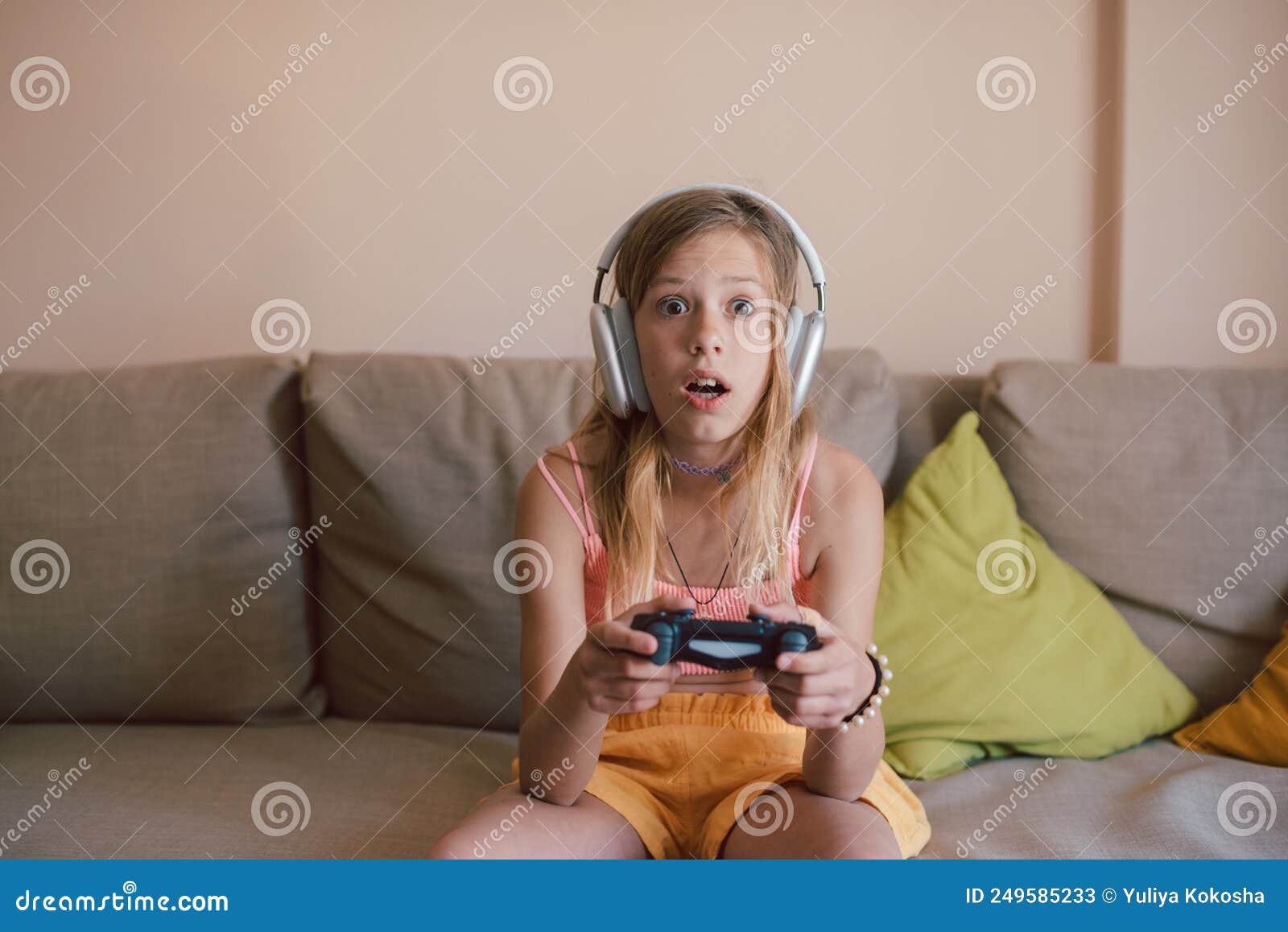 Girl playing video games stock image. Image of bedroom - 249585233