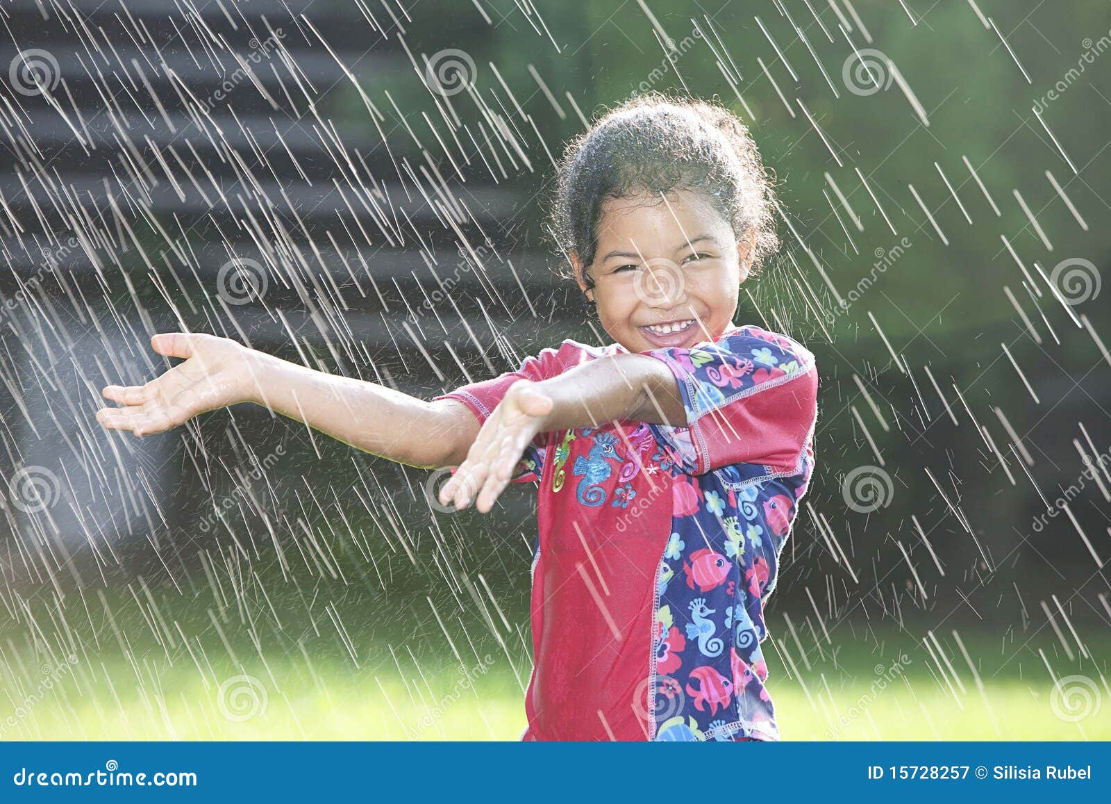 Girl Playing in Water Sprinkles Stock Image - Image of fresh, green ...