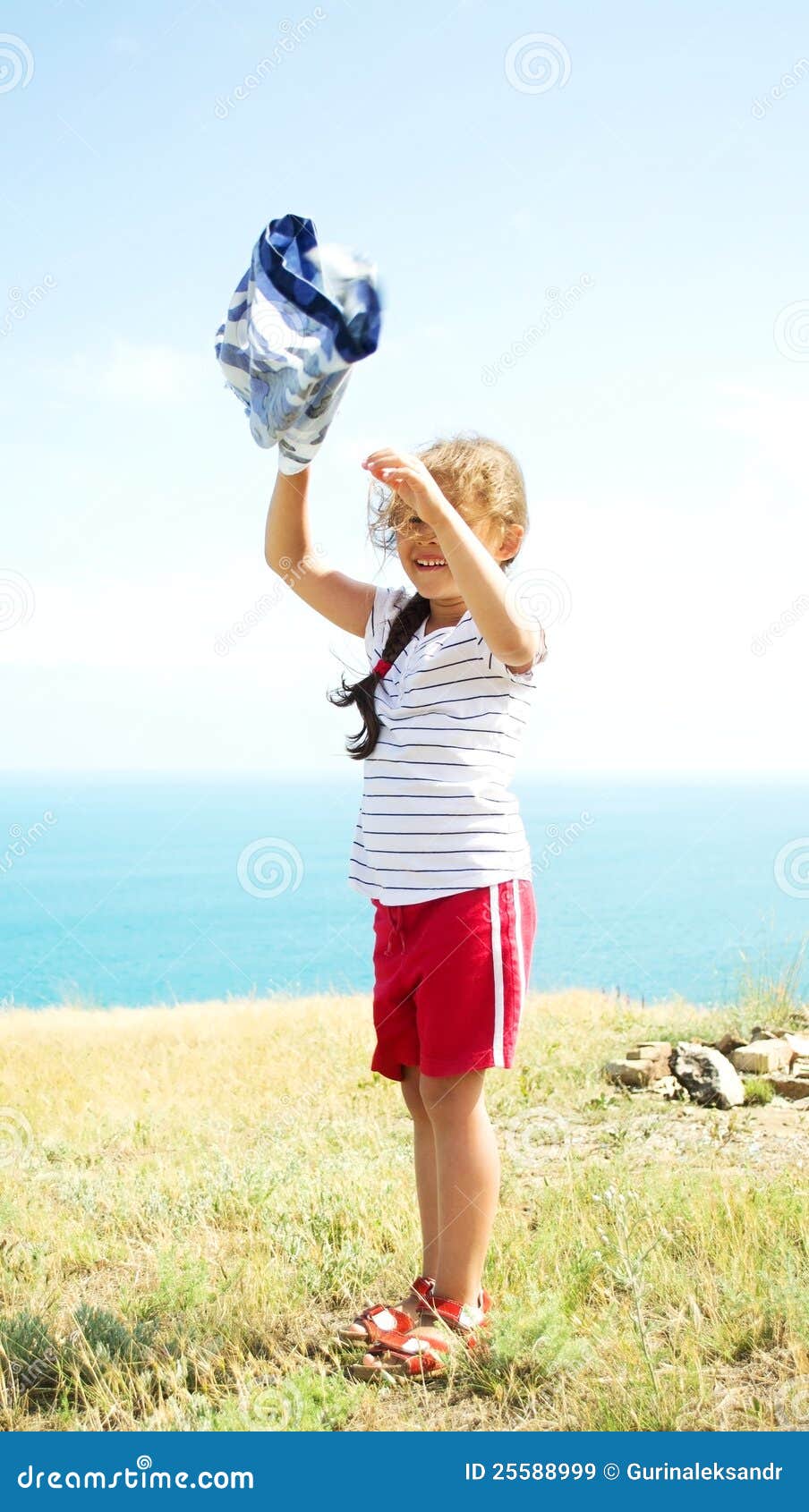 Girl plays with a cloth stock image. Image of beach, flowing - 25588999