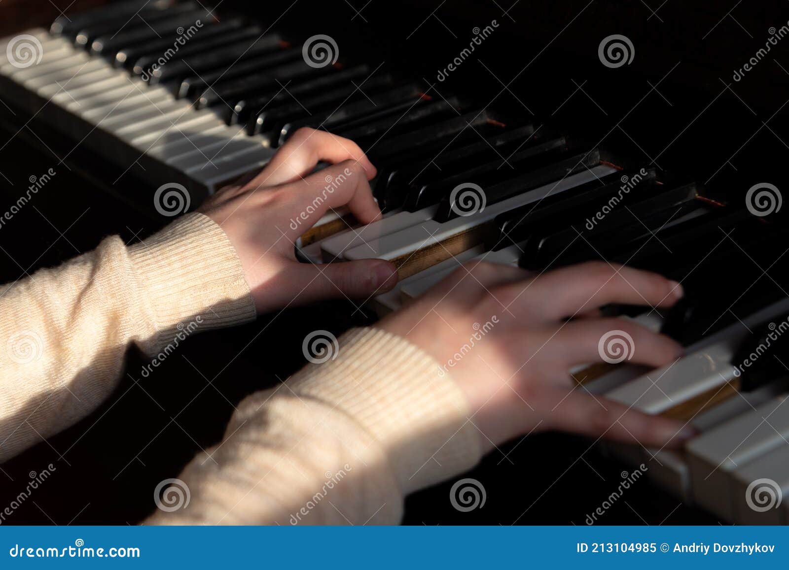The Girl Plays the Piano, Typing Chords with the Keys Stock Image ...