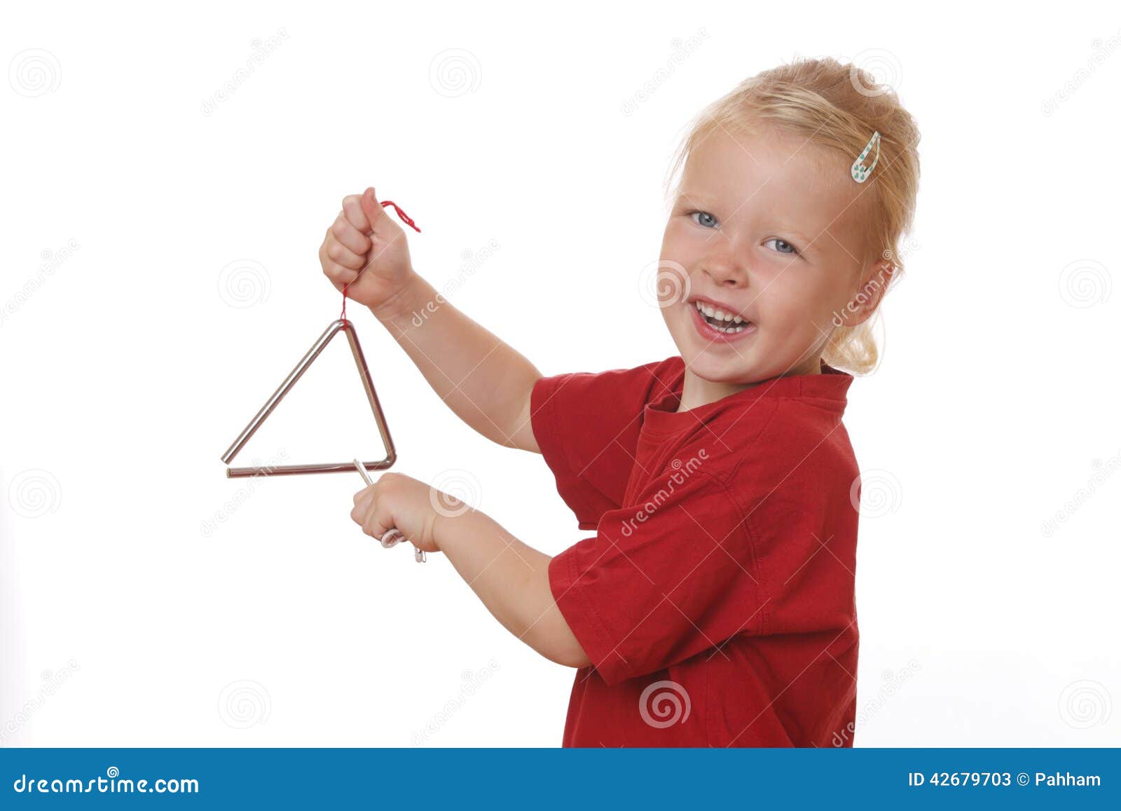 Girl plays triangle stock image. Image of person, ringtone - 42679703