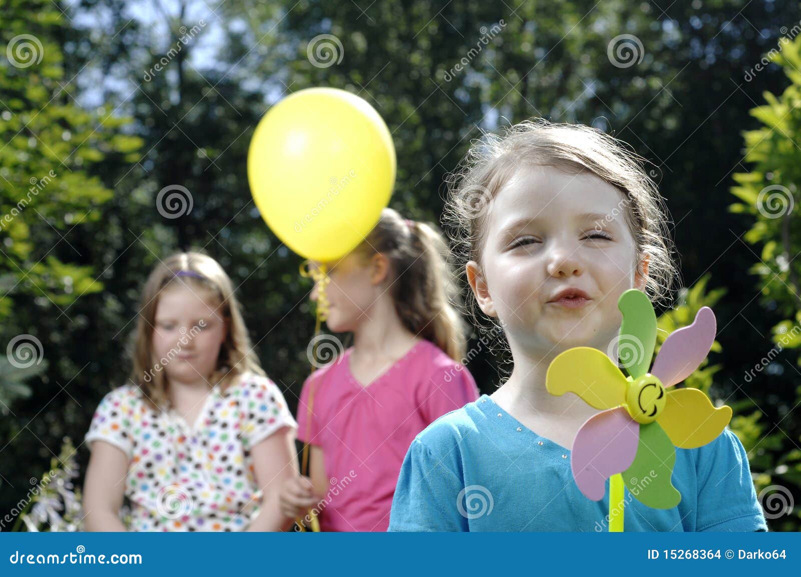 Girl plays with windmill stock photo. Image of freedom - 15268364