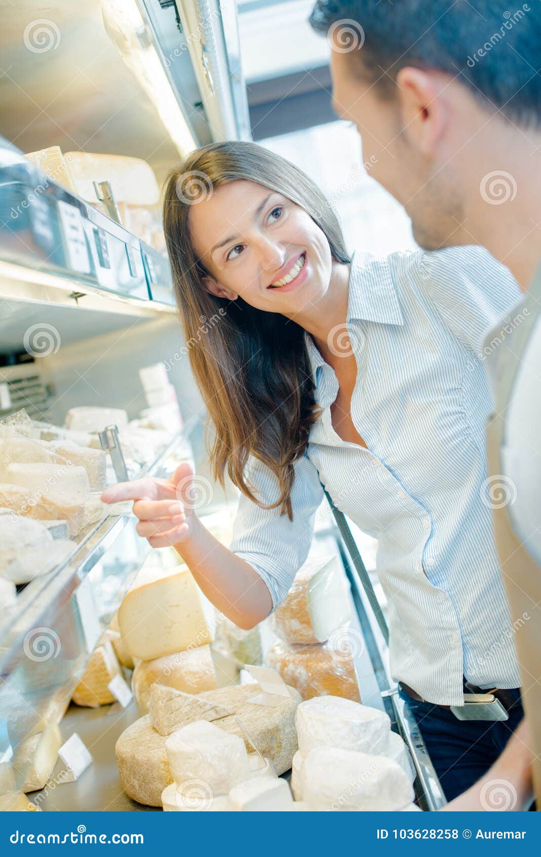 Girl pointing at cheese stock photo. Image of choice - 103628258