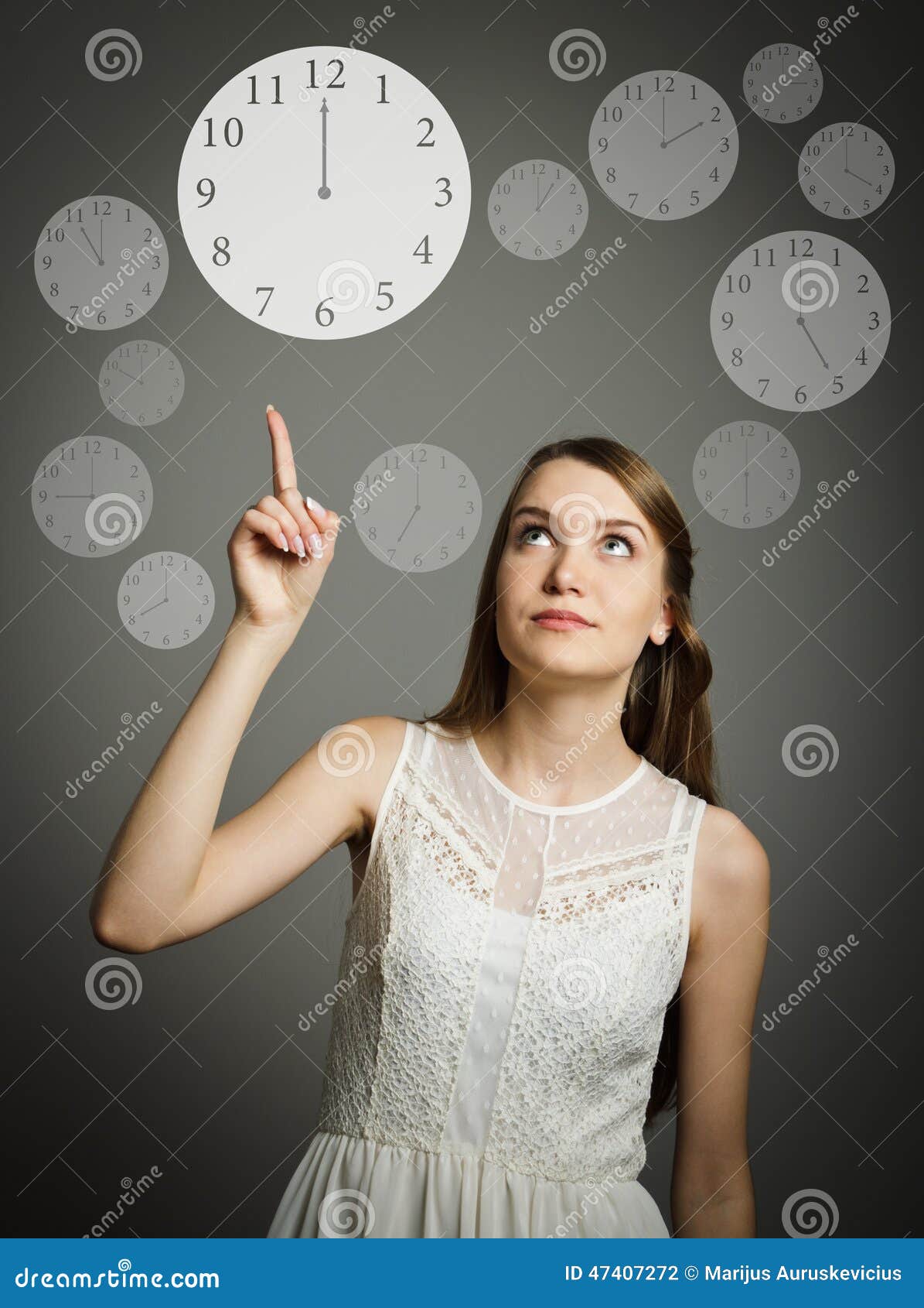 Girl pointing at a clock. stock photo. Image of female - 47407272