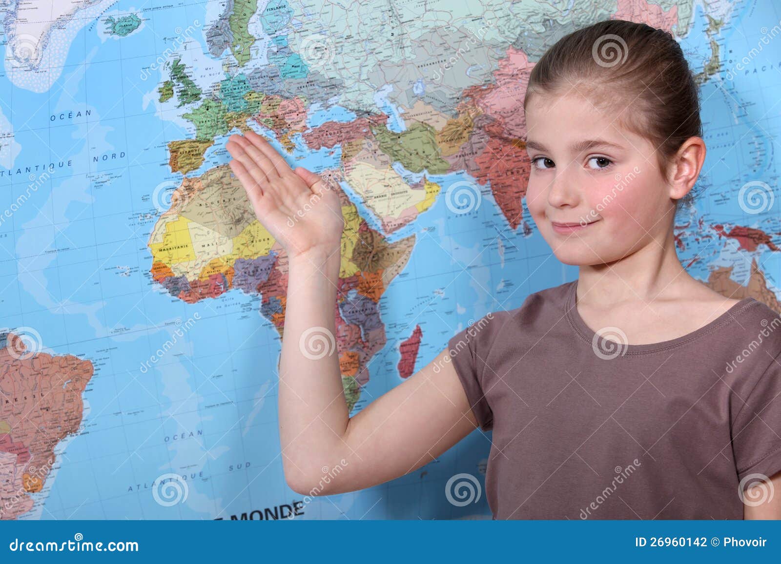 Girl pointing to map stock photo. Image of geography - 26960142