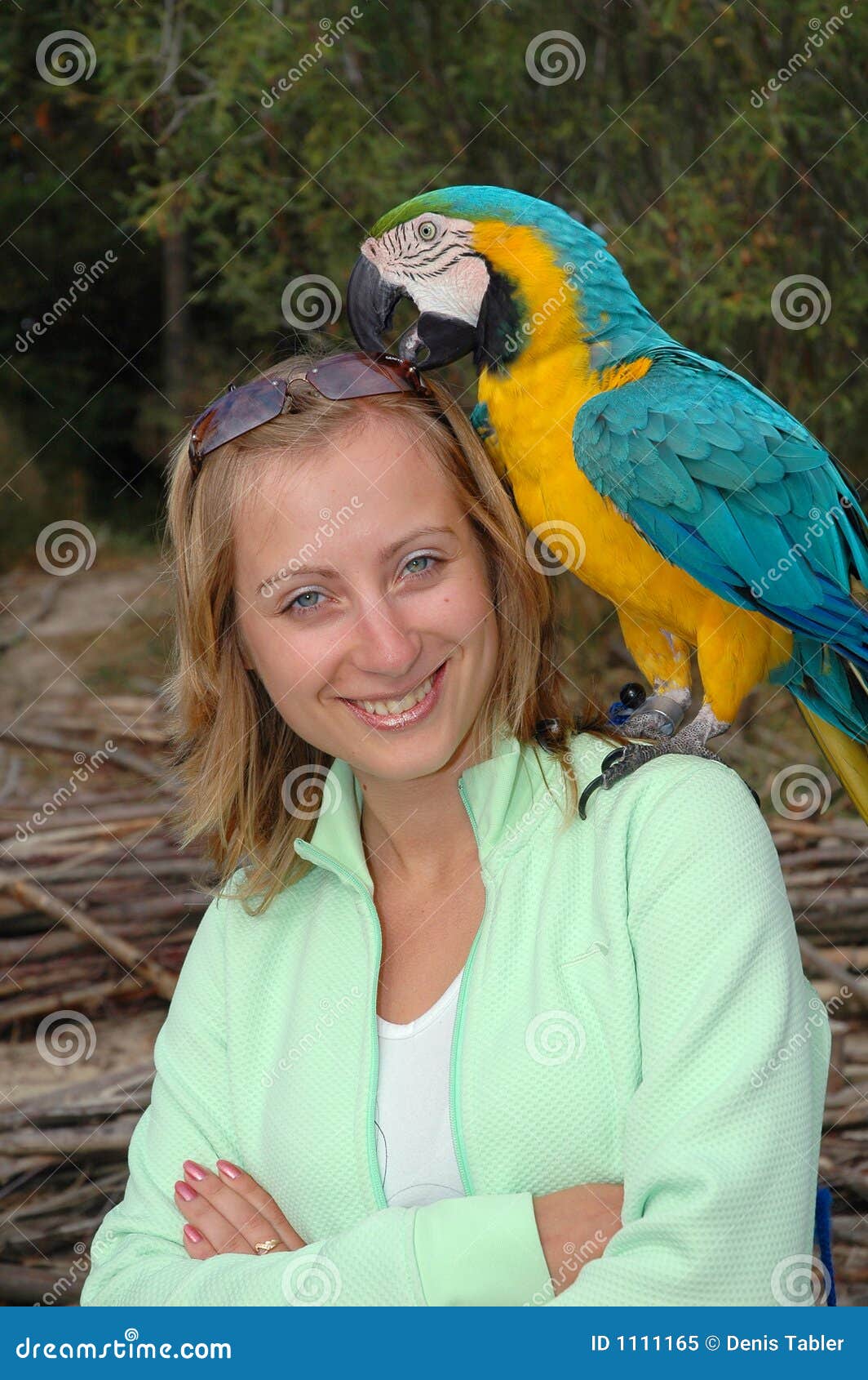 Girl portrait with parrot stock image. Image of green - 1111165