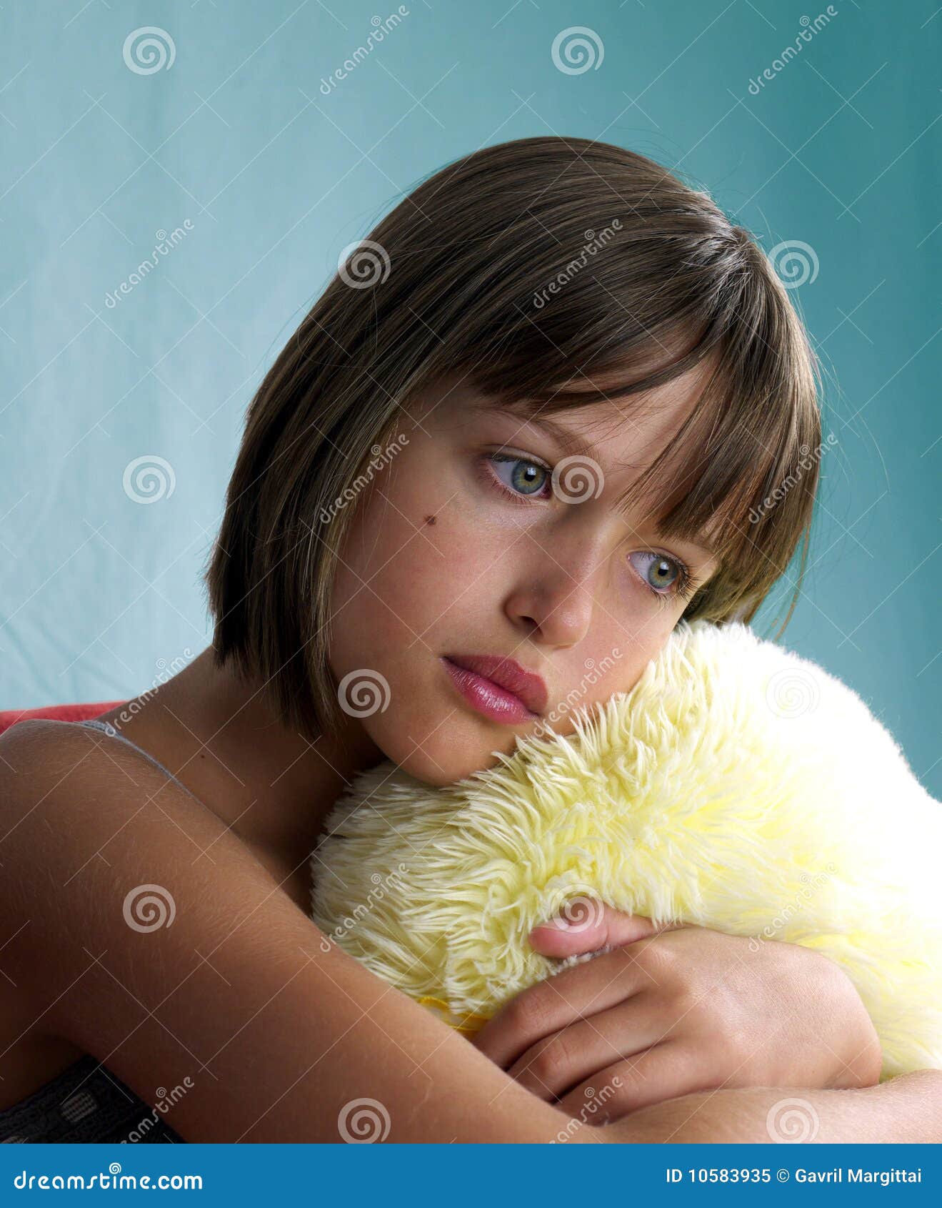 Girl Portrait with Yellow Pillow Stock Image - Image of hands, years ...