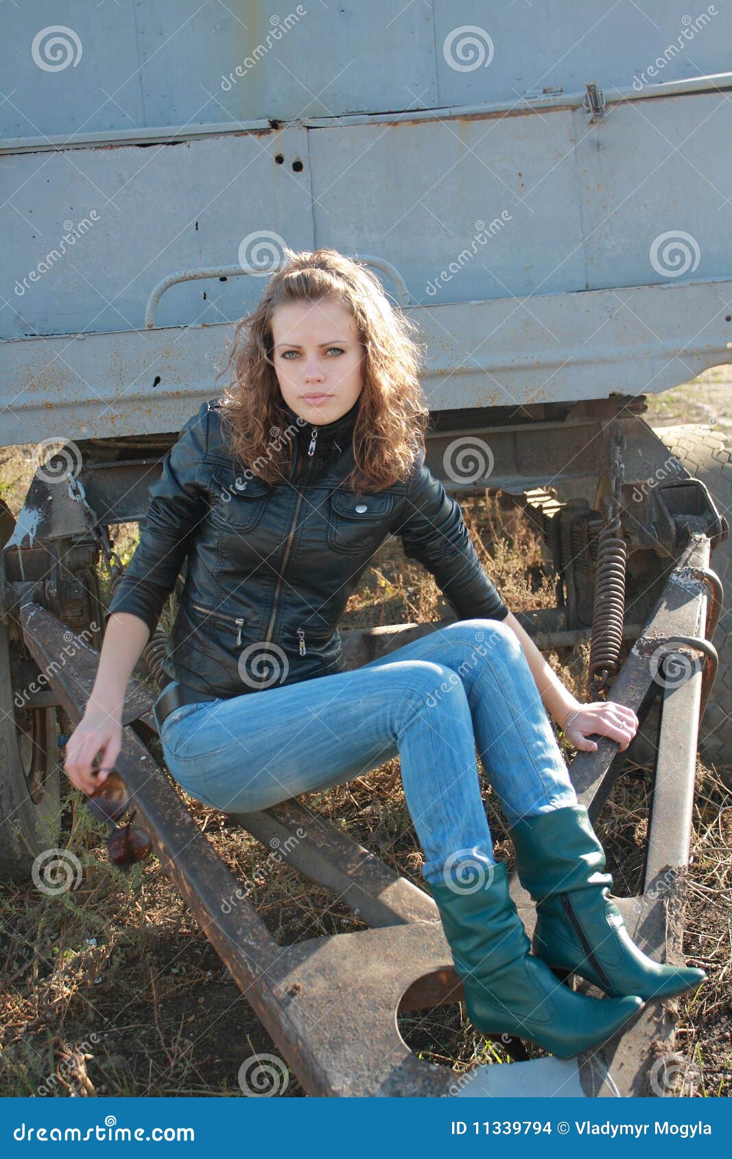 Girl Poses Near the Iron Trailer Stock Photo - Image of trailer, light ...