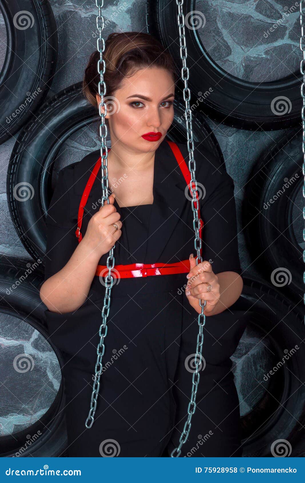 Girl is posing with chains stock photo. Image of adult - 75928958