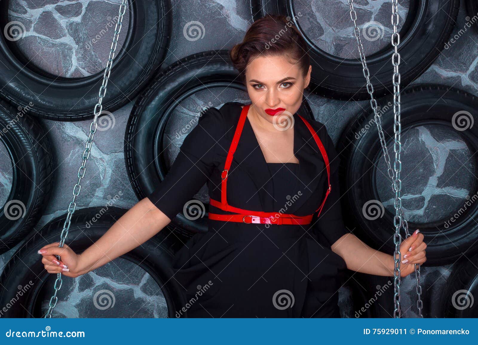 Girl is posing with chains stock image. Image of beauty - 75929011