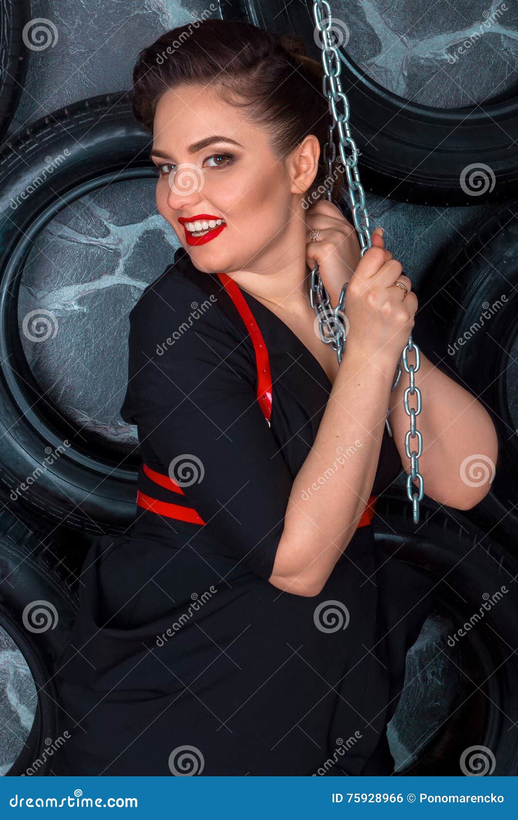 Girl is posing with chains stock photo. Image of pose - 75928966