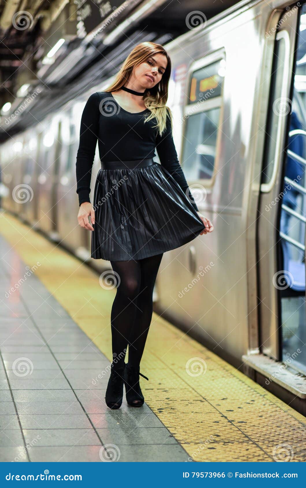 Girl posing in the subway. stock photo. Image of person - 79573966