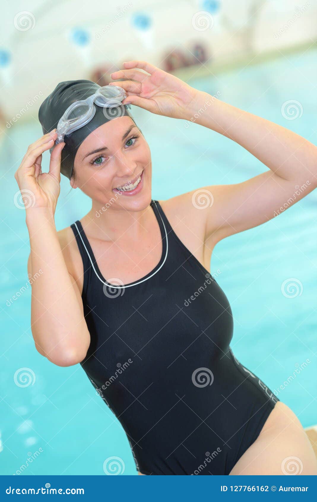 Girl posing in swimwear stock photo. Image of goggles - 127766162
