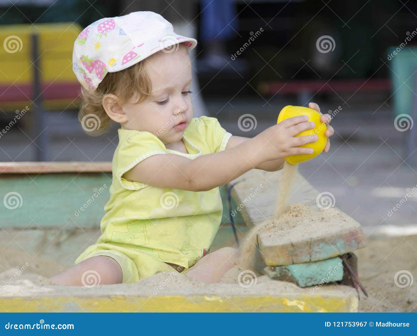 Girl is Pouring Sand in a Sandbox Stock Image - Image of interesting ...