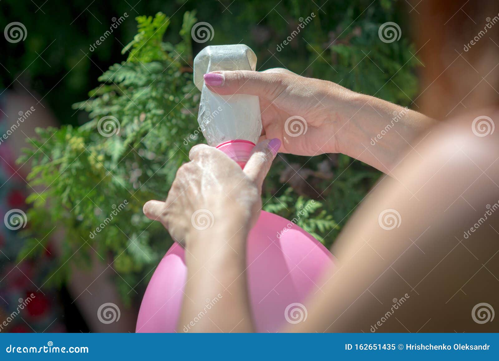The Girl Pours Flour into a Balloon Using a Bottle Stock Image - Image ...